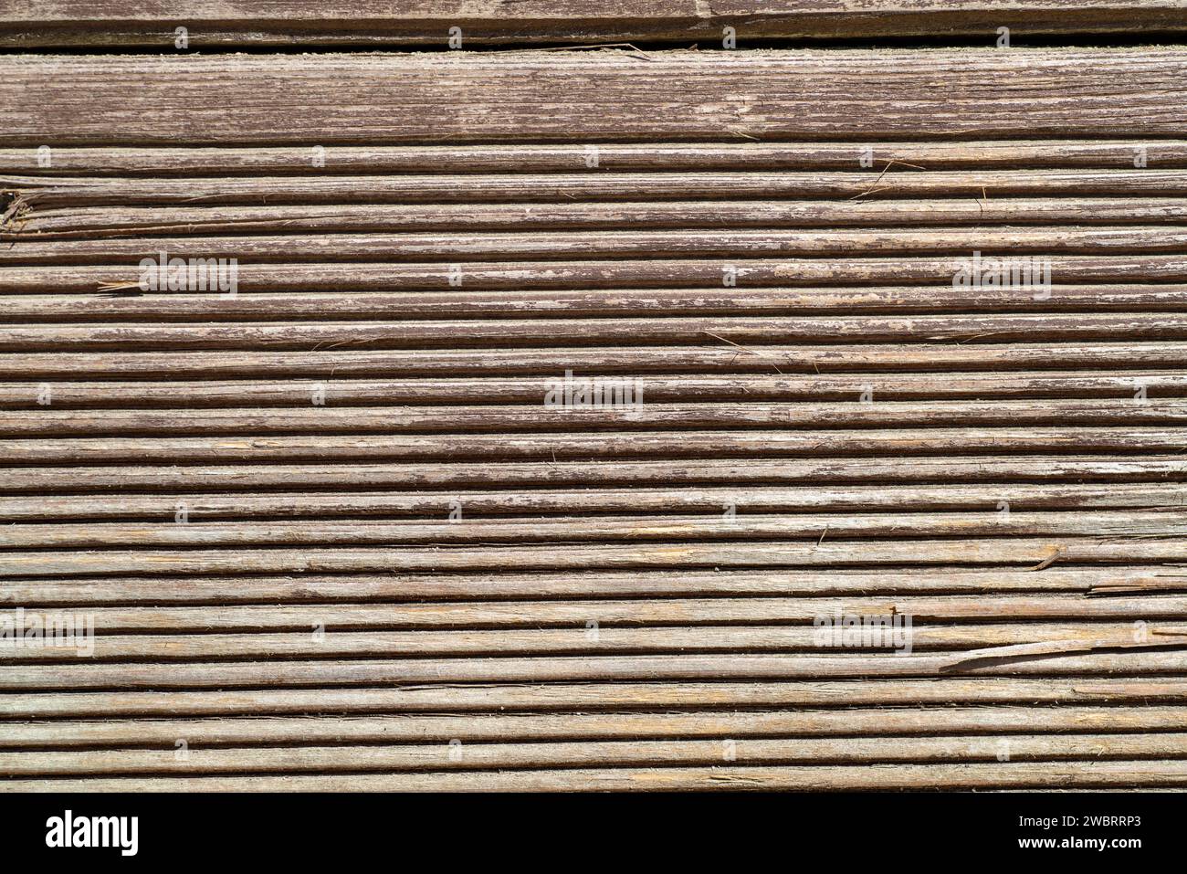 A textured processed wooden surface, a highly detailed close-up of wood ...