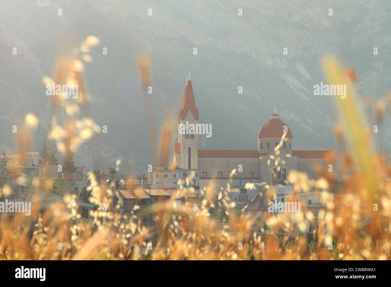 A view of Saint Saba church in the Lebanese town of Bcharre through ...