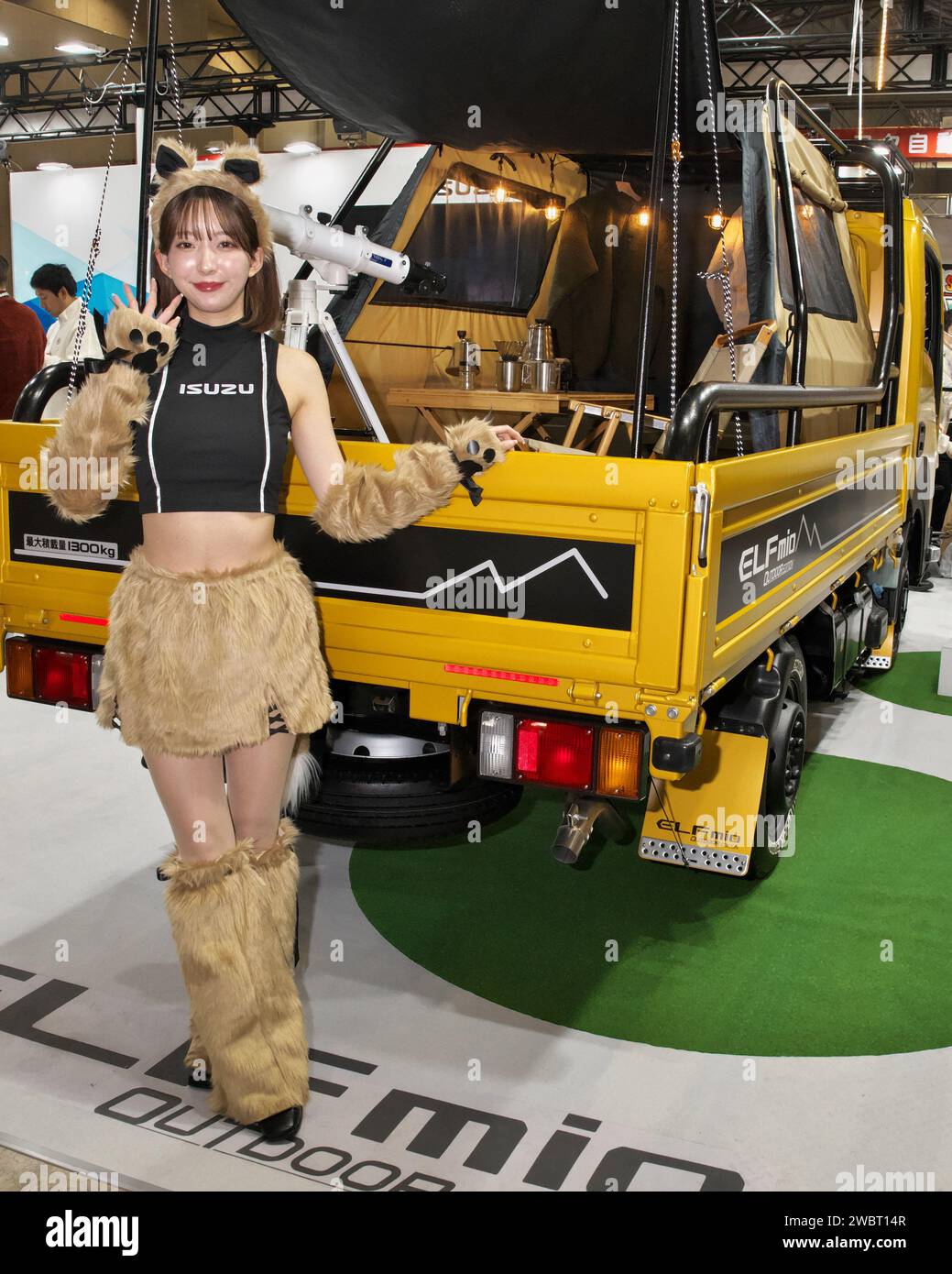Chiba, Japan. 12th Jan, 2024. A model poses for photographers during ...
