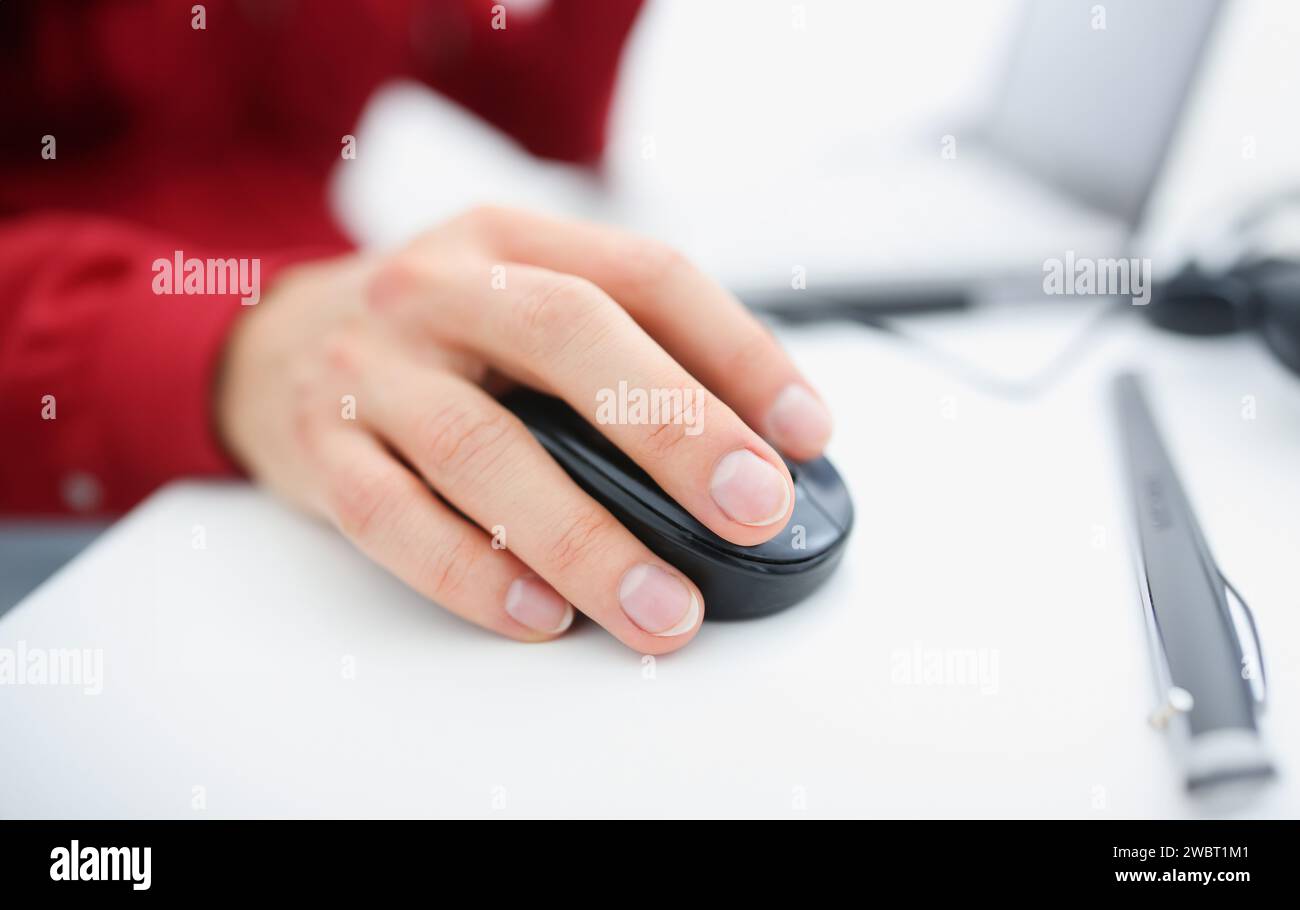 Male hand used computer mose holding in arm Stock Photo - Alamy