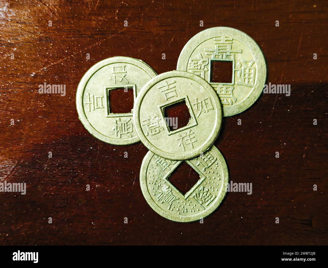 Chinese currency coins hi-res stock photography and images - Alamy