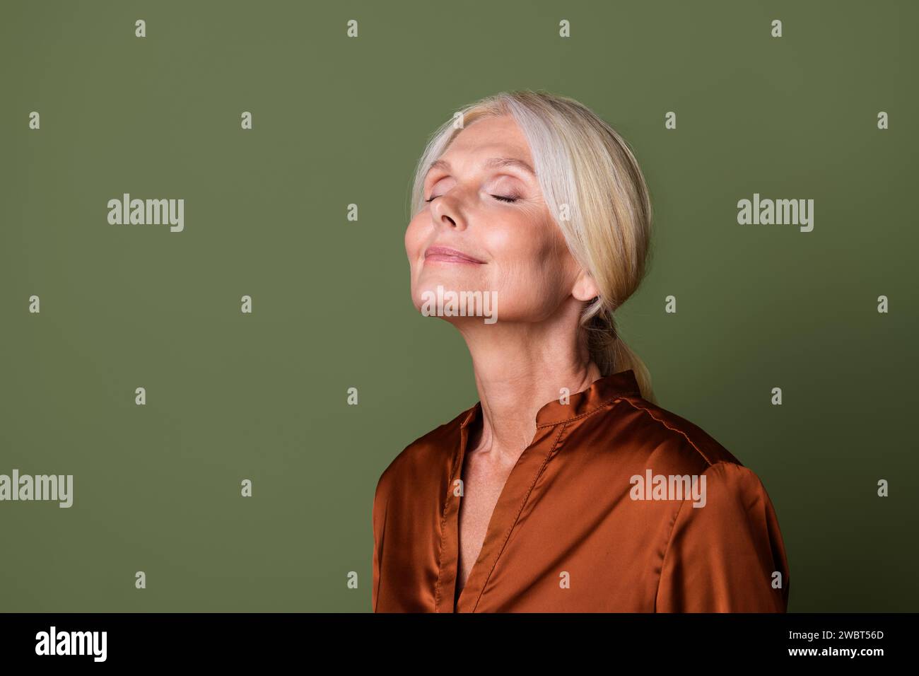 Photo portrait of pretty retired female enjoy smell aroma perfumery ...