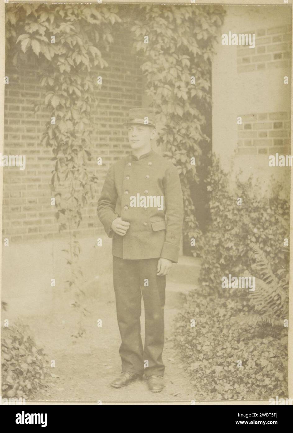 Portrait of a French boy in a uniform in a garden, c. 1900 - c. 1910 ...