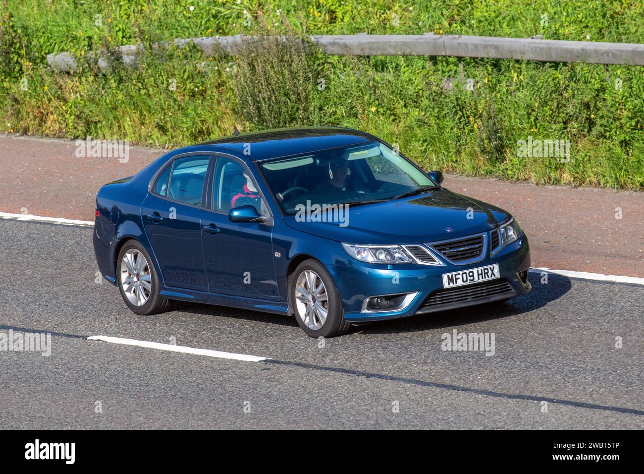 2009 Saab 9-3 Aero Ttid Auto car travelling on the M6 motorway in Greater Manchester, UK Stock ...