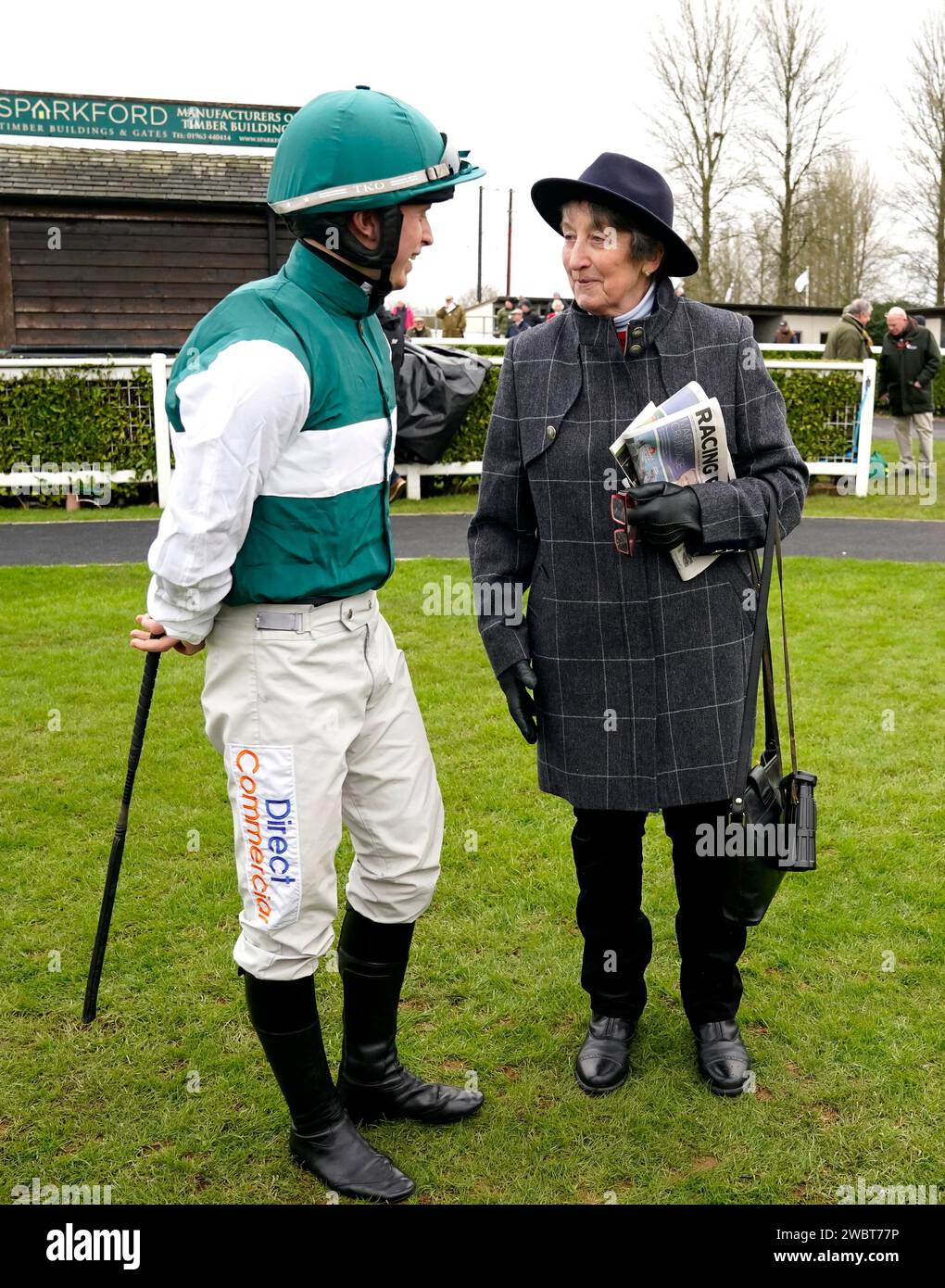 Trainer Henrietta Knight (right) speaks with jockey James Bowen ahead ...