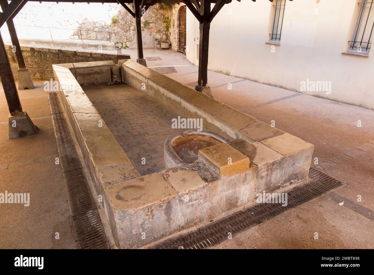 Communal public Lavoir, a stone sink trough to aid water hygiene. Old ...