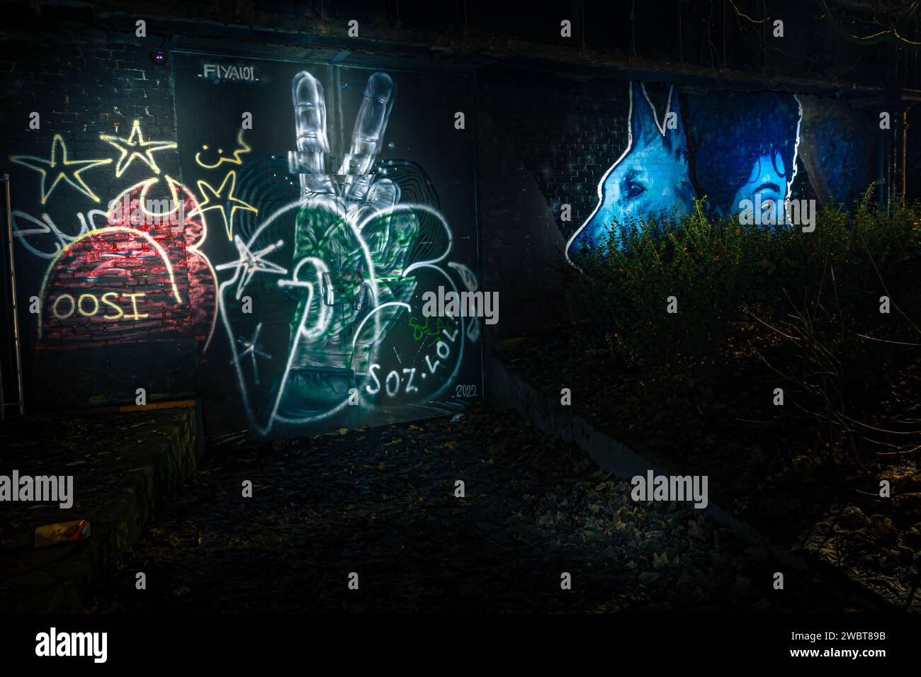 Hands up for peace and portraits in the urban gallery of the night ...