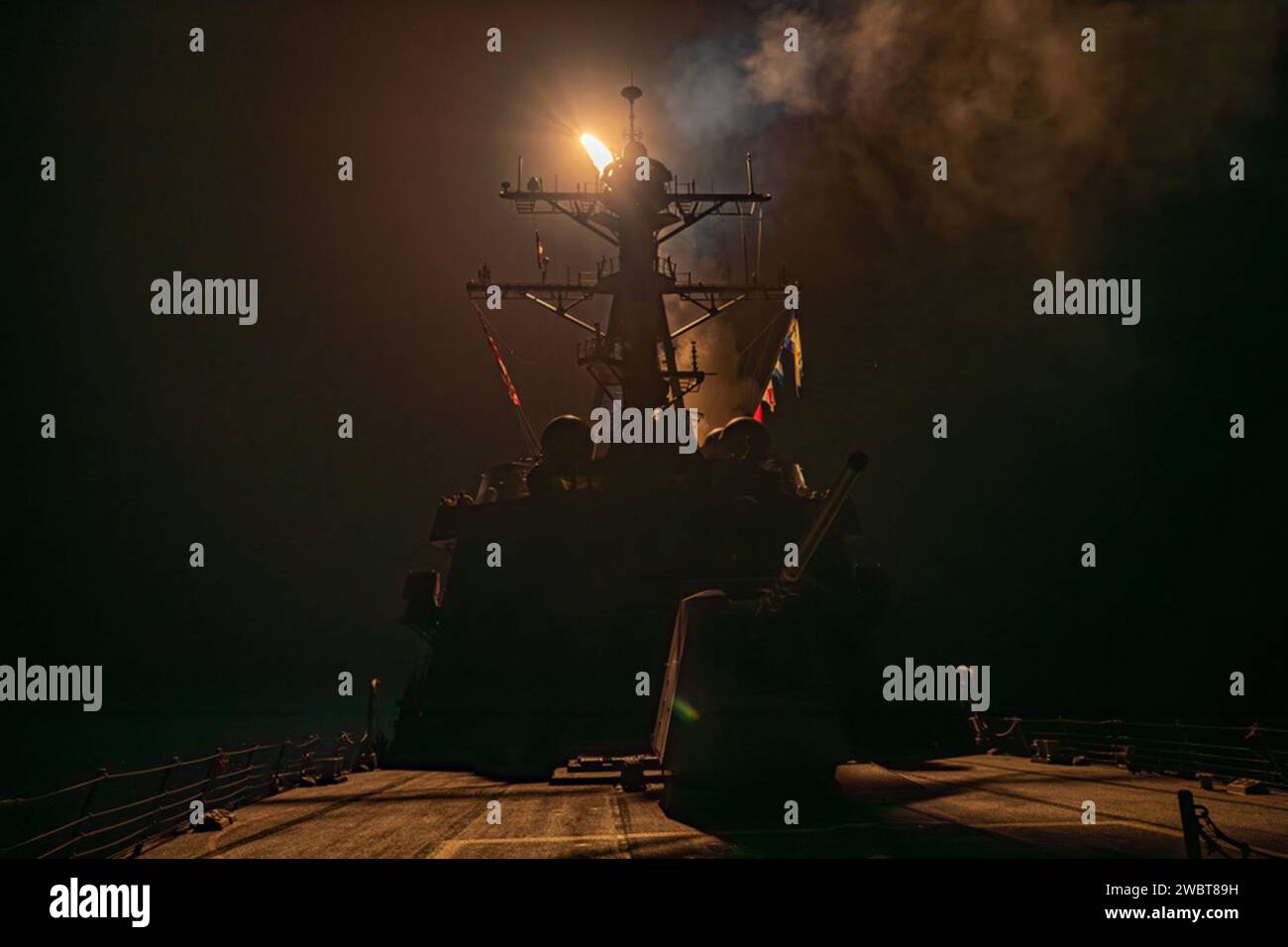 A U.S. Navy Arleigh Burke class DDG is pictured launching Tomahawk ...