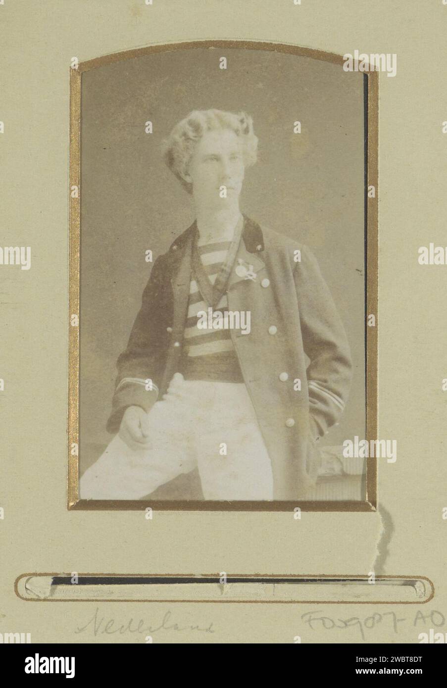 Portrait of a (presumably) Dutch sailor, sitting with awards, Adolphe ...