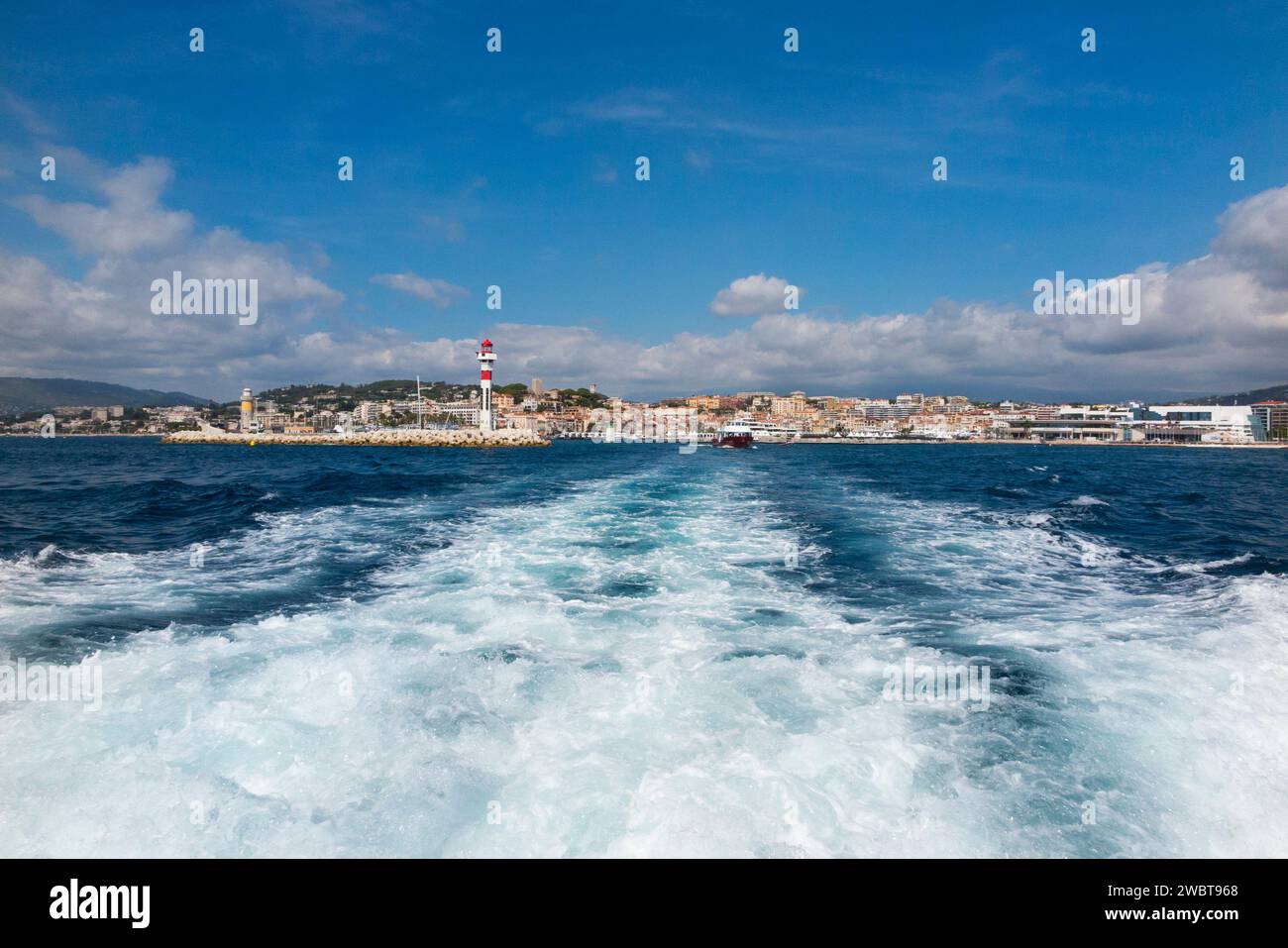 Scene from a fast boat leaving Cannes port / harbour in France with ...