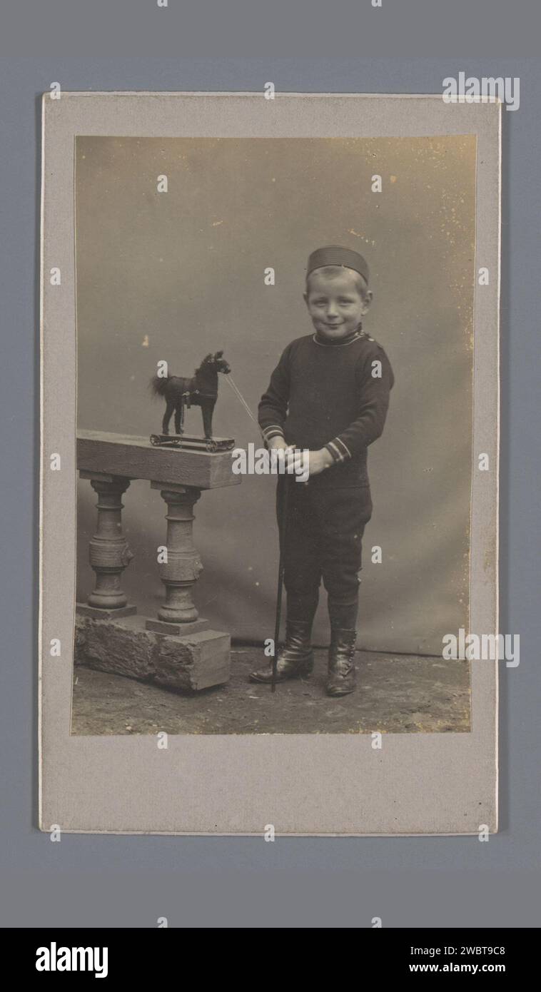 Portrait of Gerrit Looman with a toy horse, Anonymous, 1900 - 1914 ...