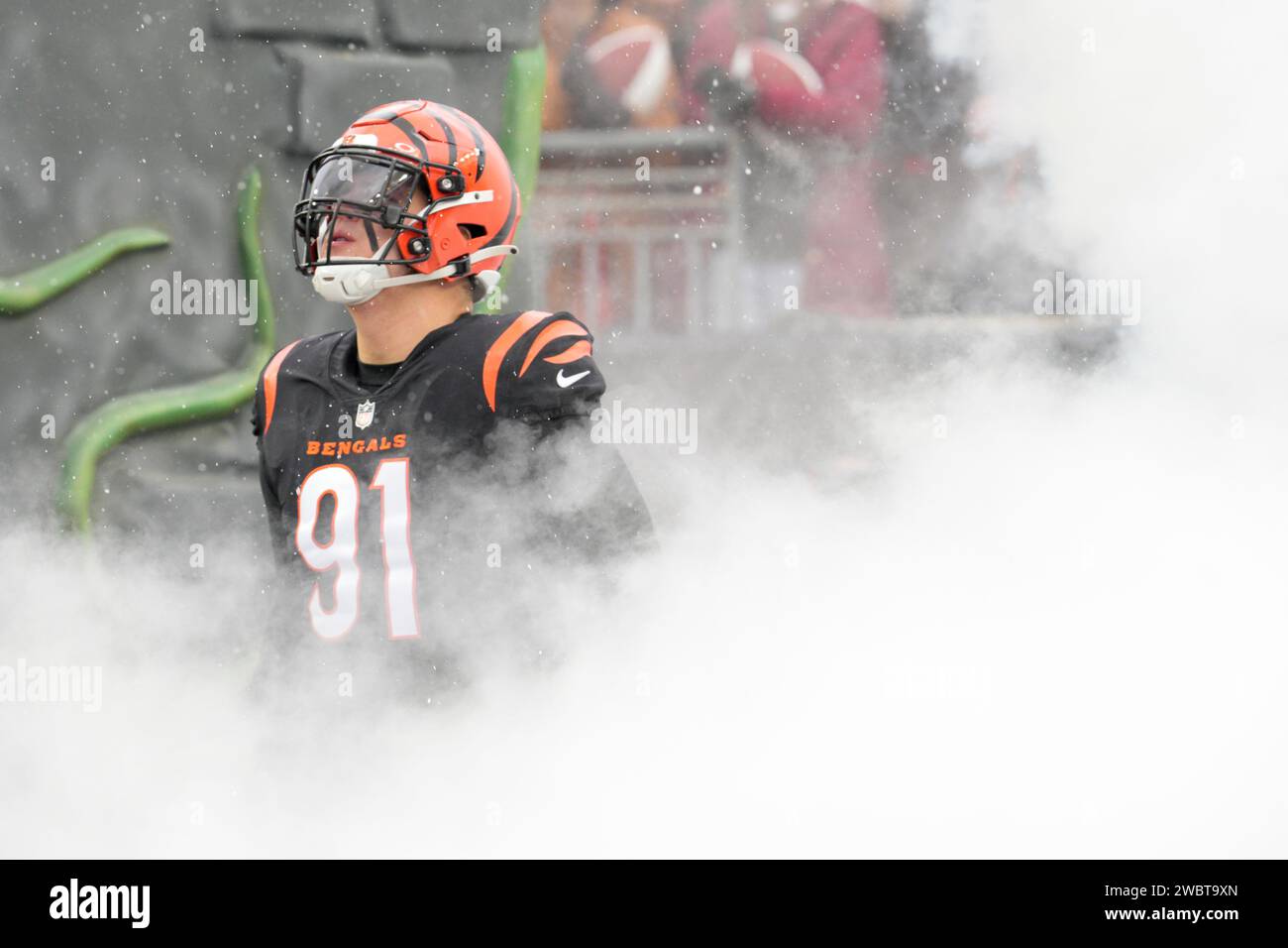 Cincinnati Bengals defensive end Trey Hendrickson runs onto the field ...