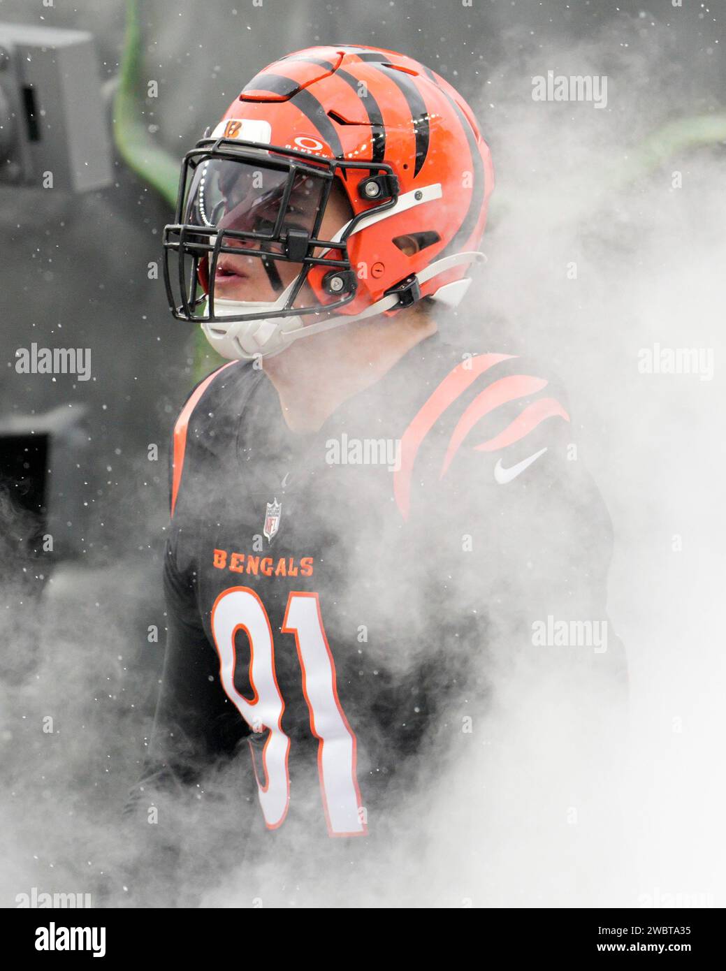 Cincinnati Bengals defensive end Trey Hendrickson runs onto the field ...