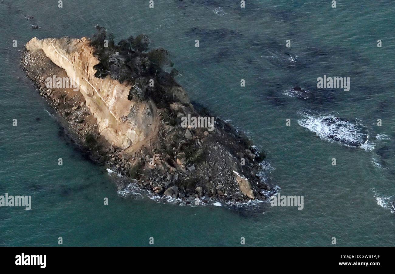 An aerial photo shows Mitsukejima damaged by a massive earthquake in ...
