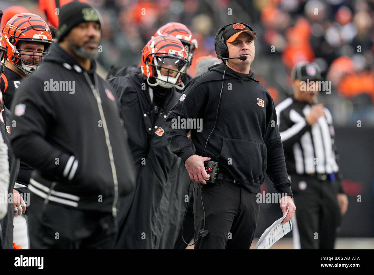 Cincinnati Bengals head coach Zac Taylor, center right, stands on the ...