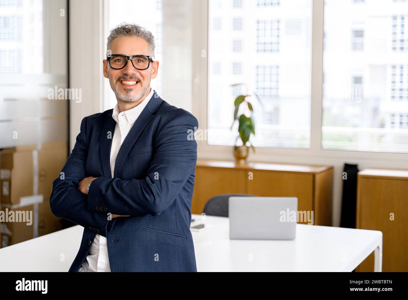 Optimistic gray-haired old hand mature businessman in formal wear ...