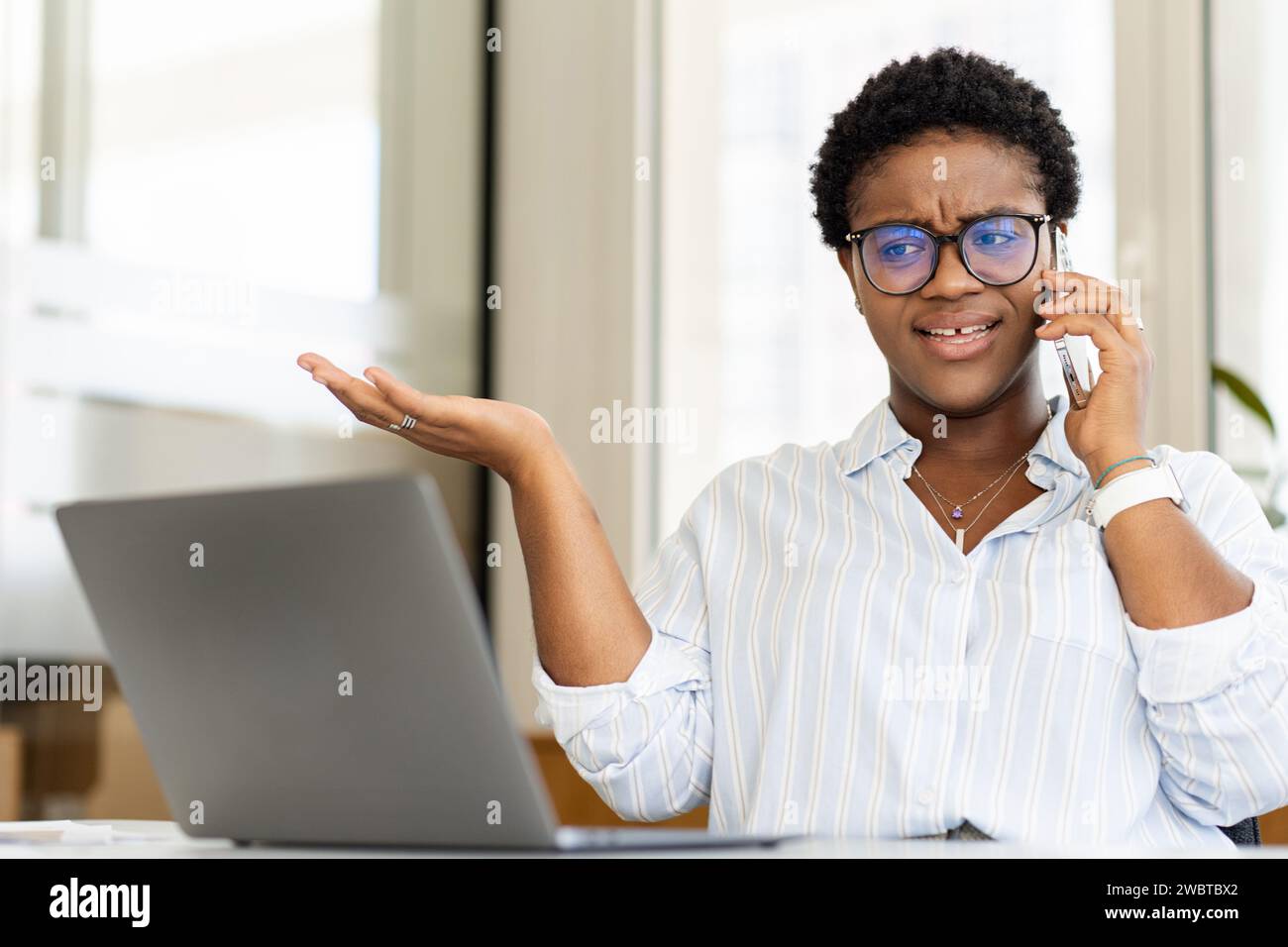 Upset african-american businesswoman having stressful phone ...