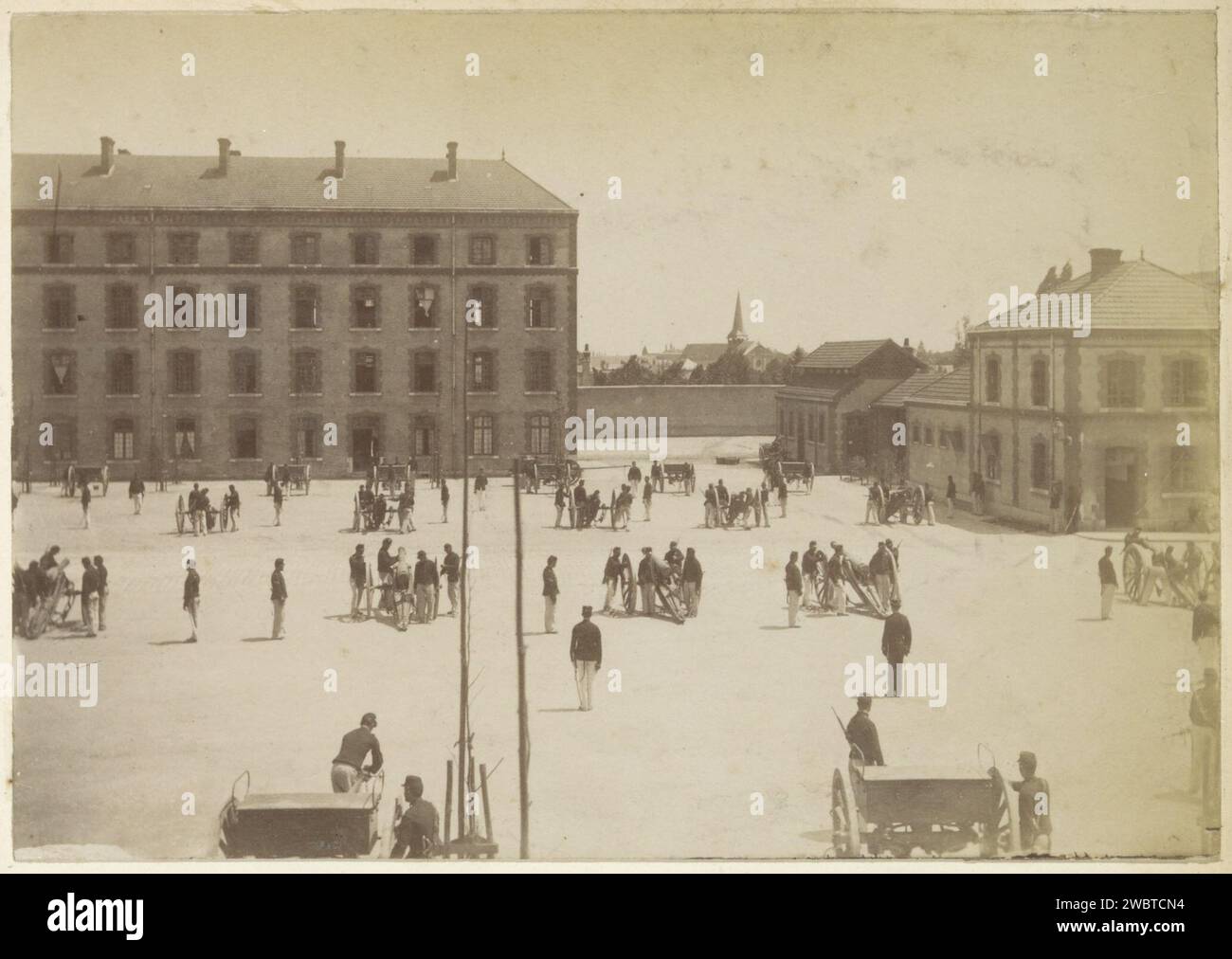 Exercise site of a barracks with soldiers and guns in France, c. 1900 ...