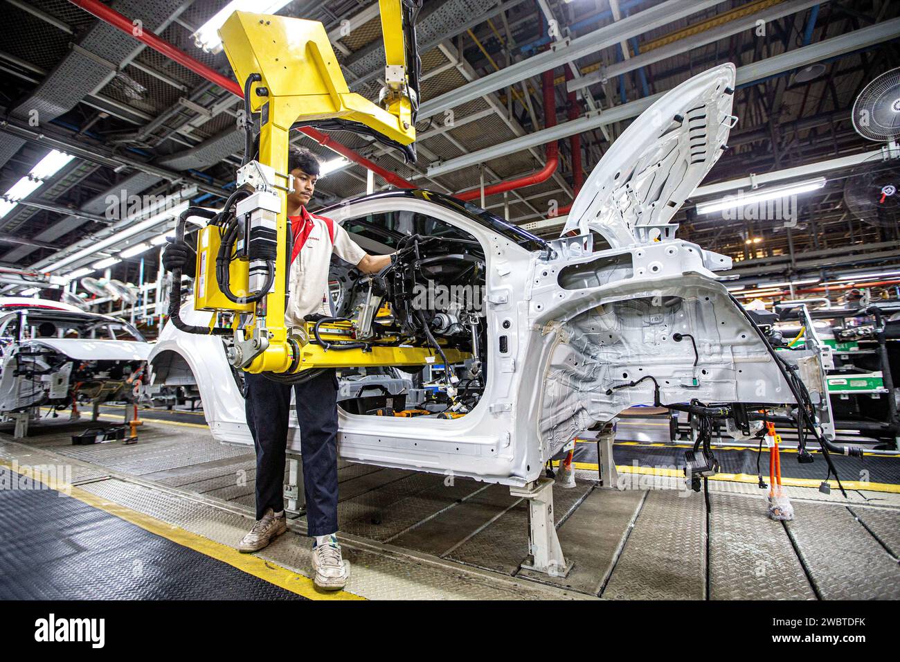 Rayong, Thailand. 12th Jan, 2024. A worker works at the Great Wall ...