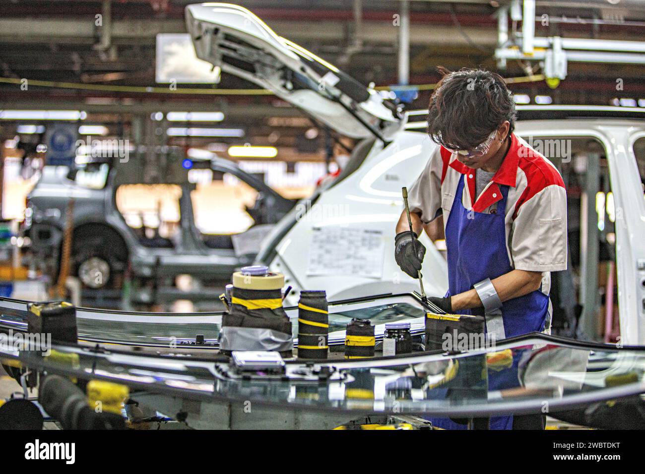 Rayong, Thailand. 12th Jan, 2024. A worker works at the Great Wall ...