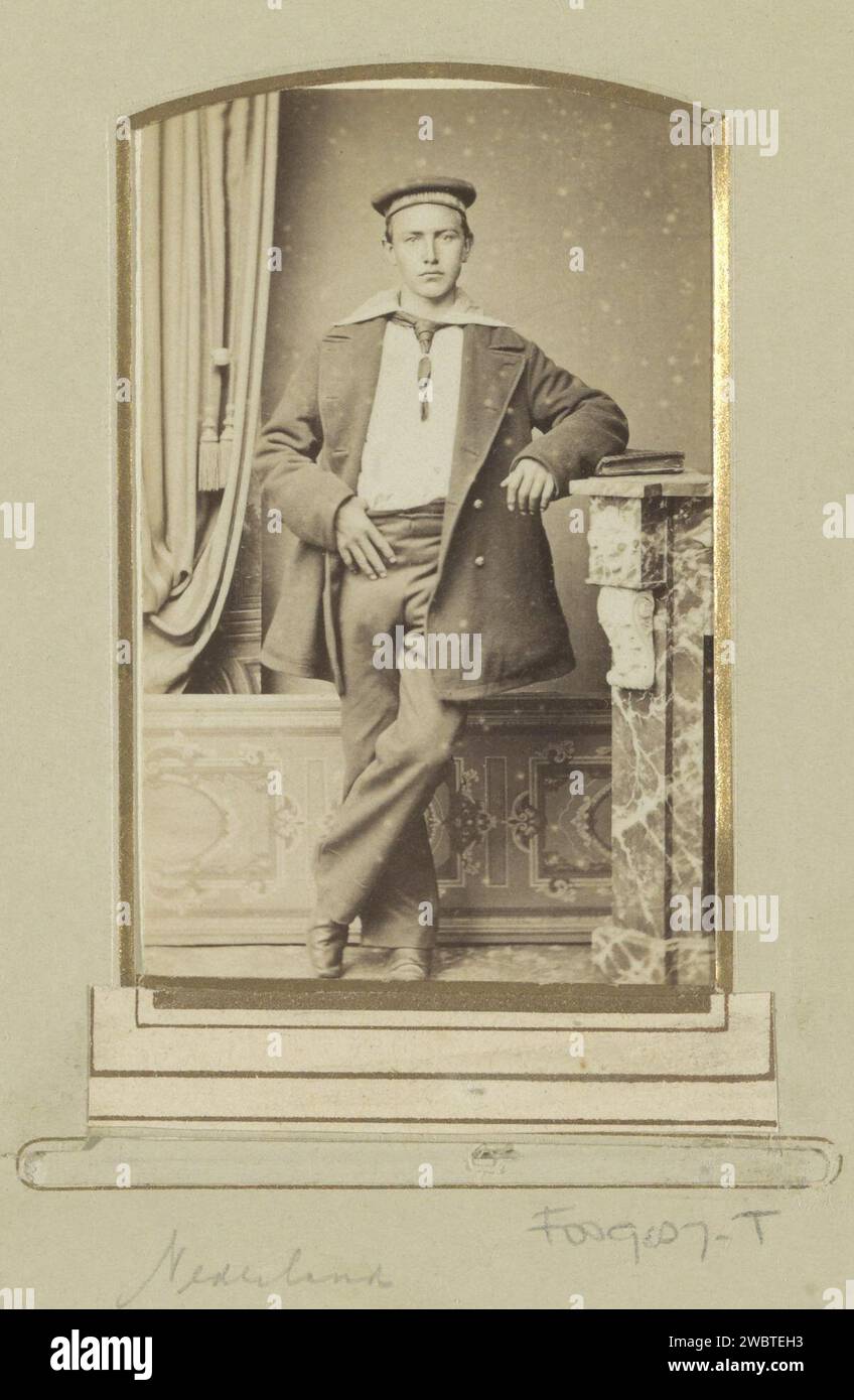 Portrait of a (presumably) Dutch sailor, standing by a fireplace ...