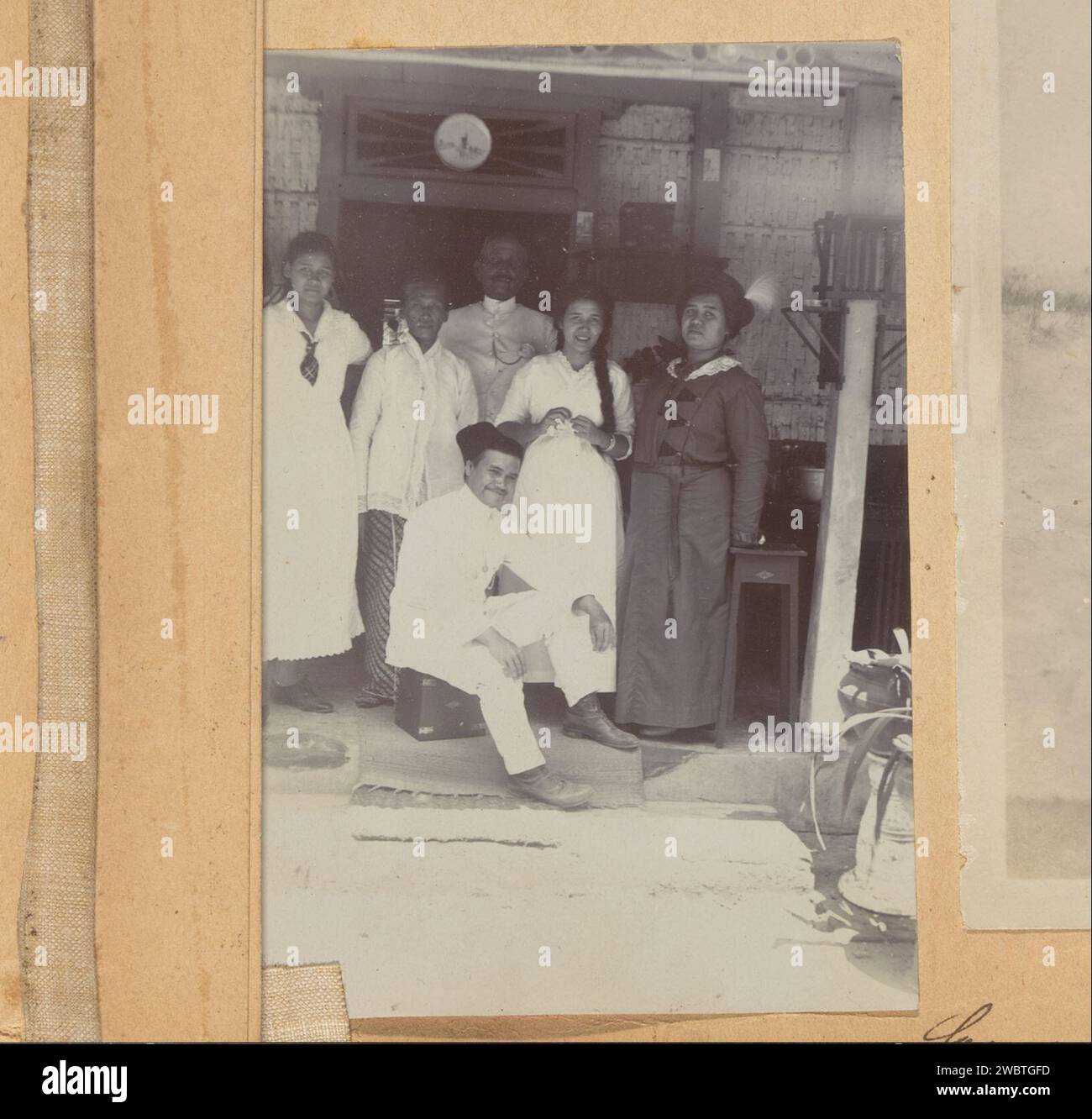 Group portrait of the Van Ede family on a porch, presumably in ...