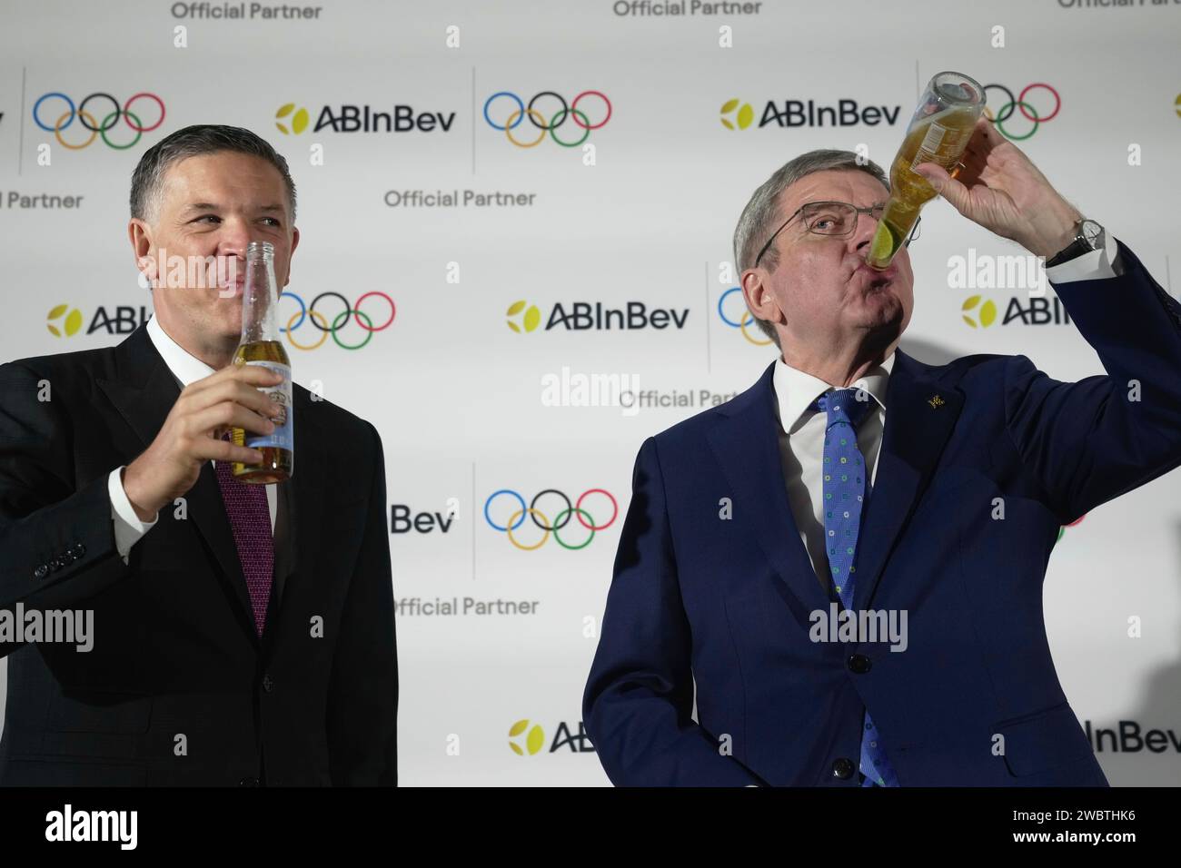 Anheuser-Busch InBev CEO Michel Doukeris, left, and President of the ...