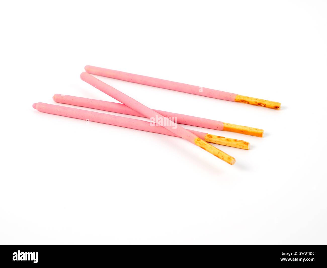 Crispy sticks in pink sugar glaze. Sticks in berry pink glaze on a ...