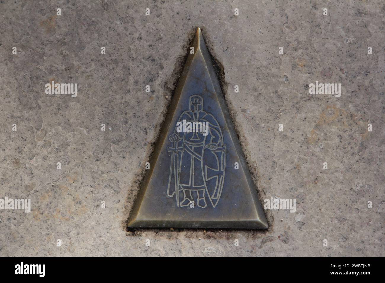 These engraved brass triangles embedded in the pavements of Troyes ...
