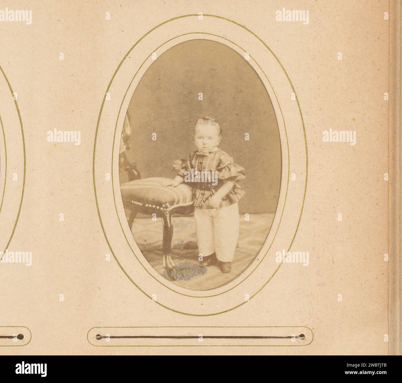 Portrait of a toddler, standing by a chair, Idanus Hendrikus Slaterus ...