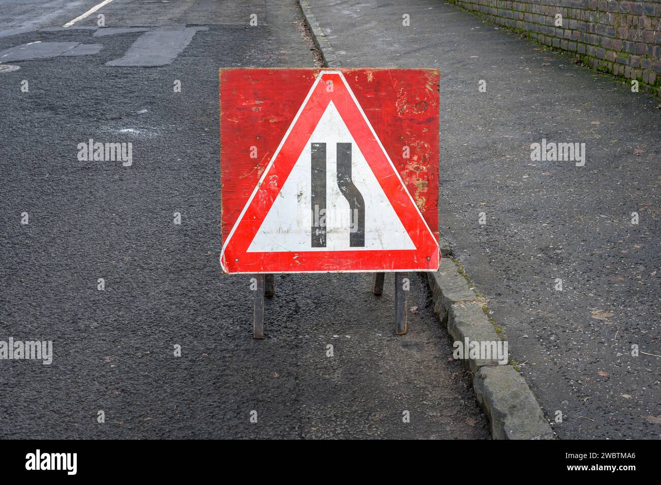 Road narrows on right sign at roadworks, UK Stock Photo - Alamy