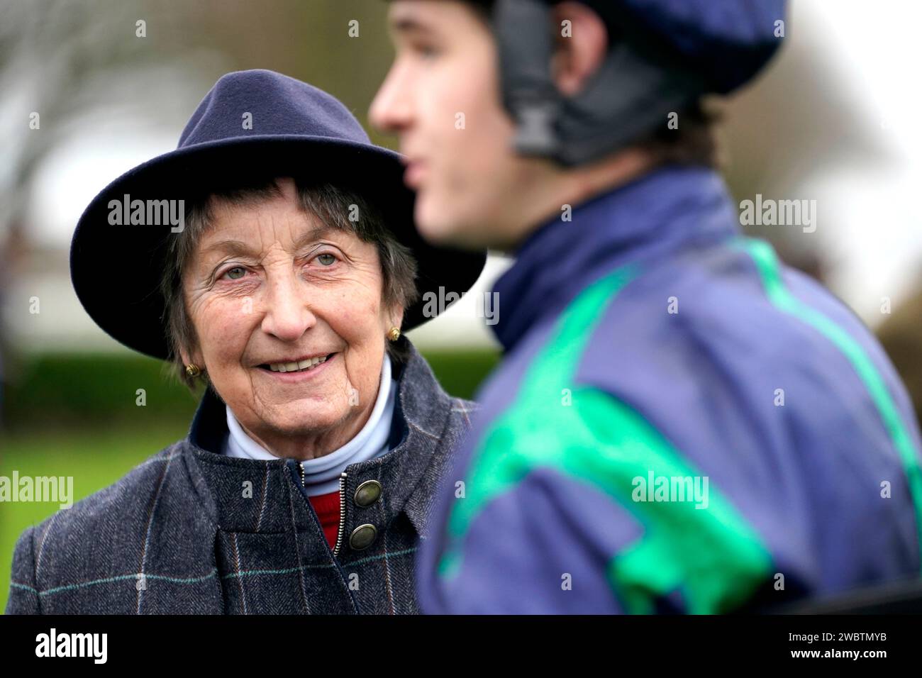 Trainer Henrietta Knight in the parade ring with jockey Brendan Powell ...