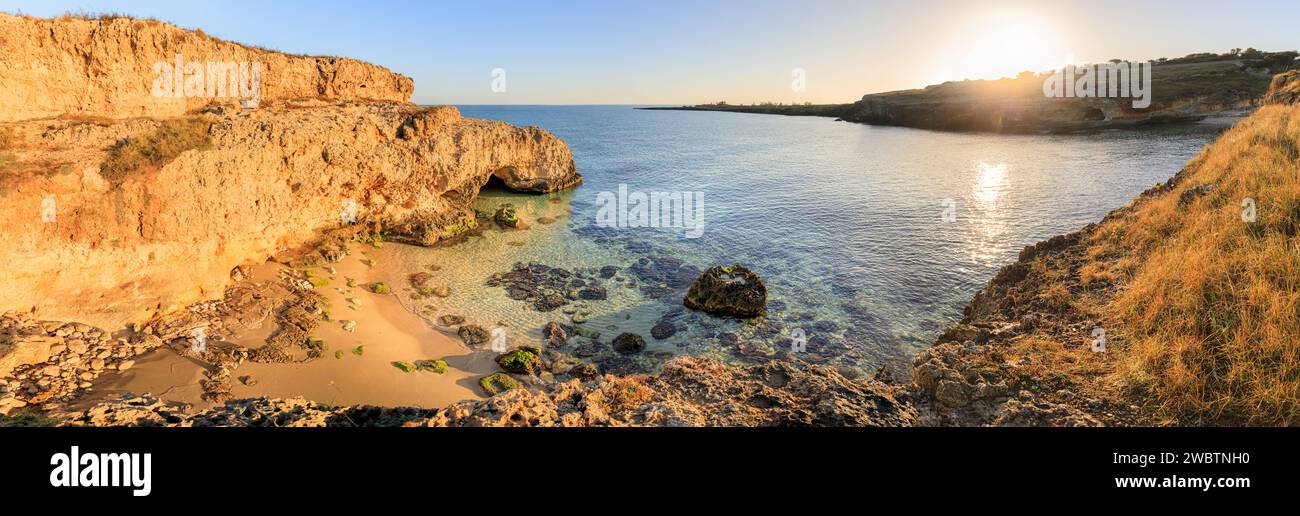 Beach small cave sunrise hi-res stock photography and images - Alamy