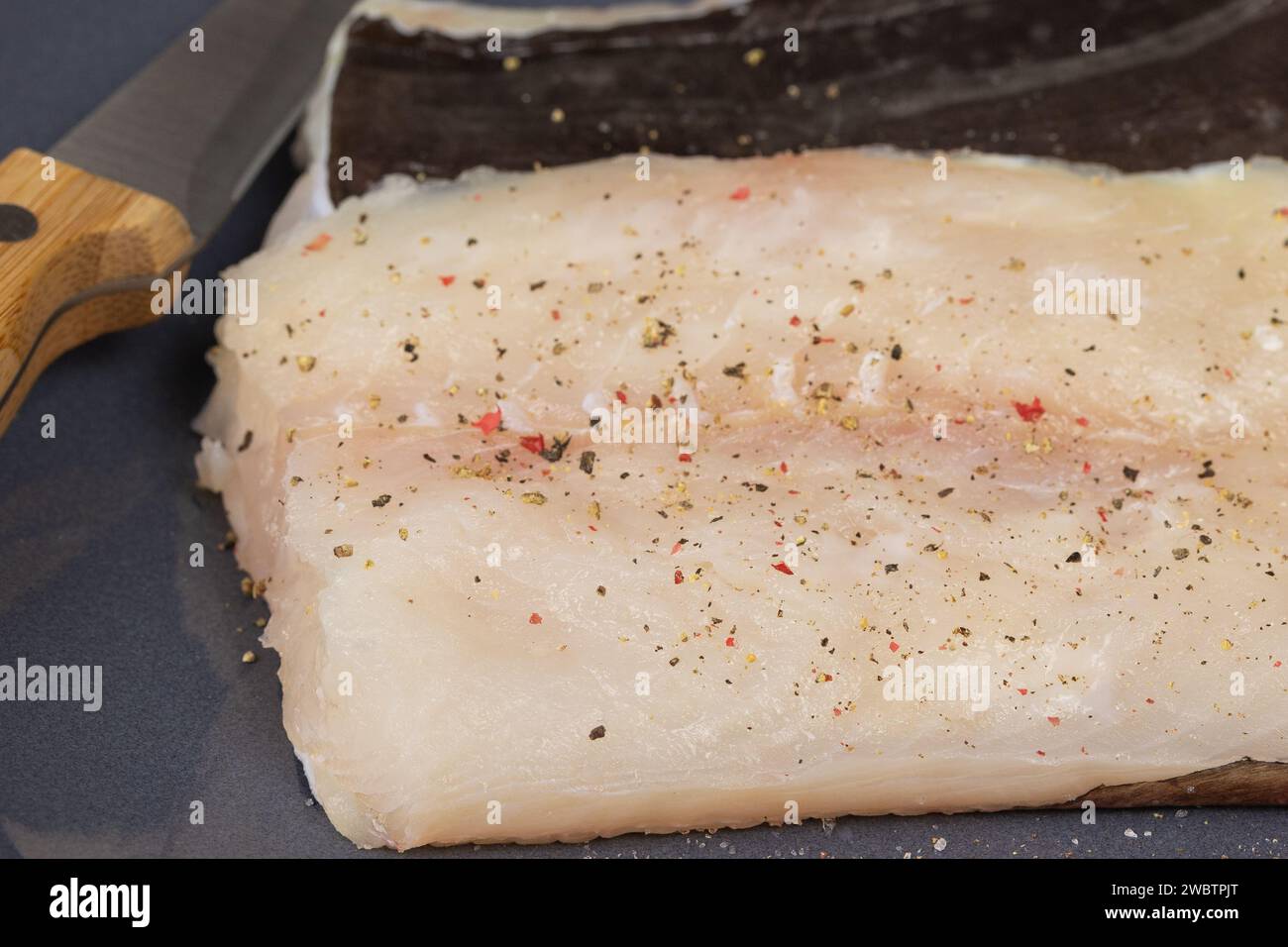 raw conger eel fillet, close-up, on a plate Stock Photo - Alamy