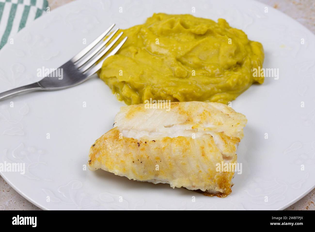 conger eel filet and split pea puree Stock Photo - Alamy