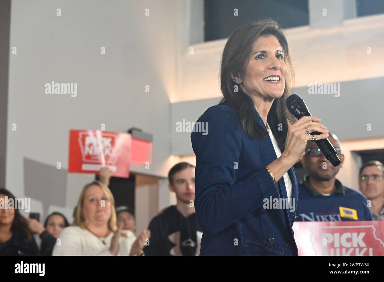 Nikki Haley enters the event space to start the countdown to caucus ...