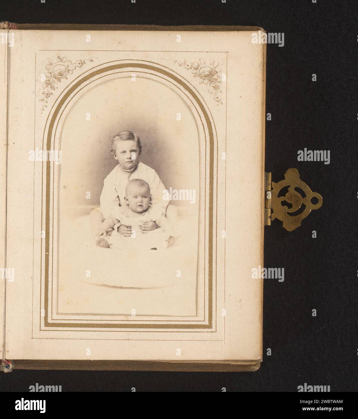 Portrait of a sitting boy with a baby, Mondel & Jacob, 1870 - 1890 ...