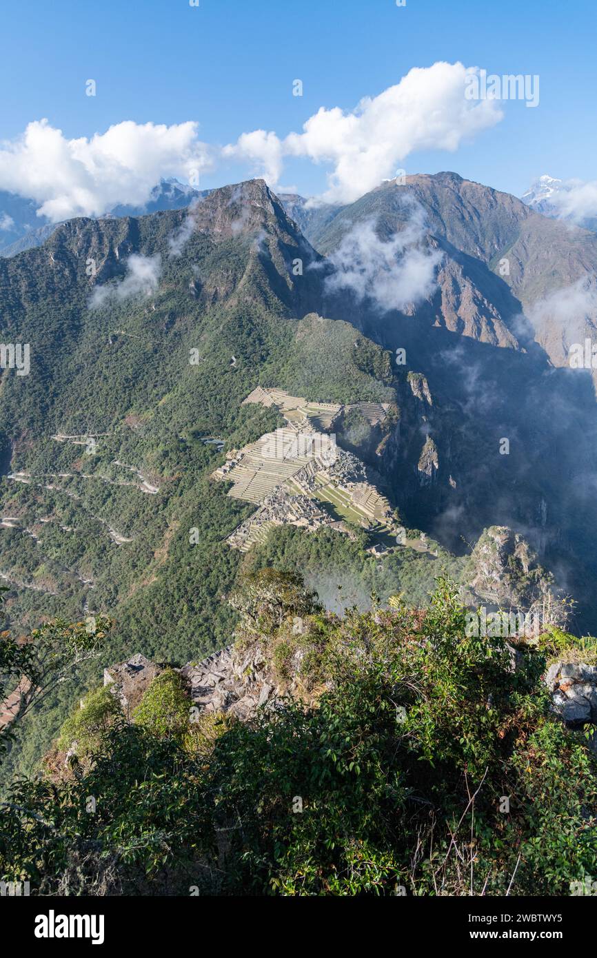 A view of Machu Picchu from the top of Huayna Picchu mountain peak on a ...