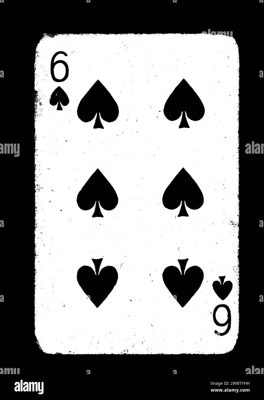 A vintage six of spades playing card isolated on a black background ...