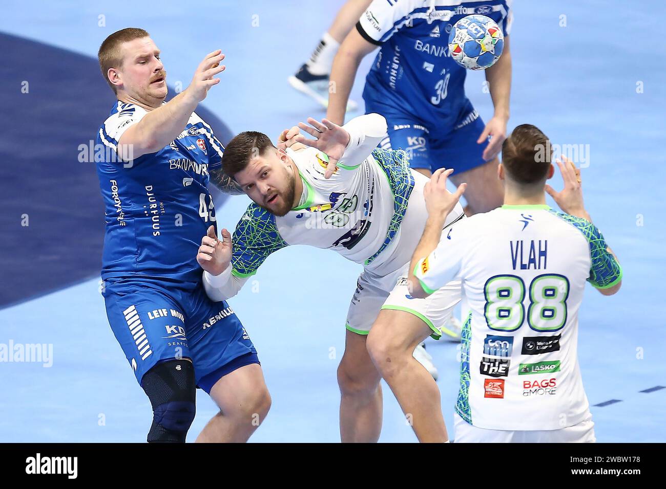 Berlin, Germany. 11th Jan, 2024. Peter Krogh, Matic Suholeznik during the Men Handball EHF Euro ...