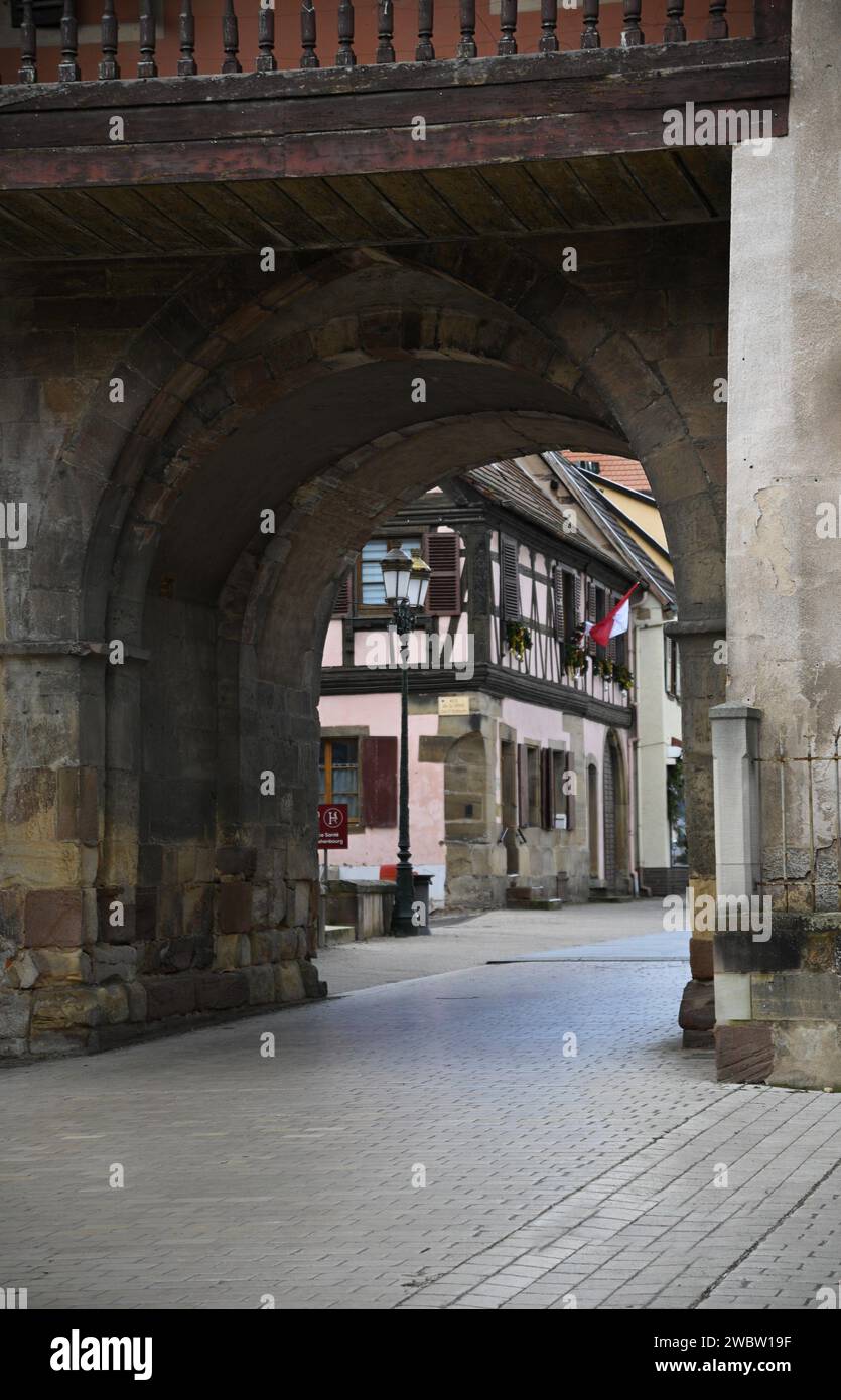Landscape with scenic view of Rosheim as seen through the arched gate ...