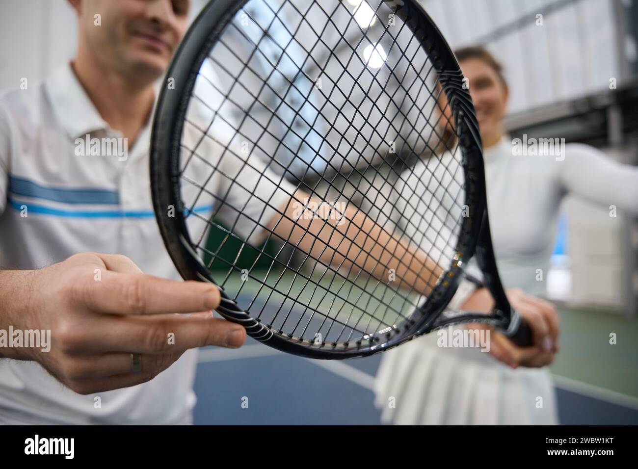 Closeup of tennis player's hand holding tennis racket preparing for ...
