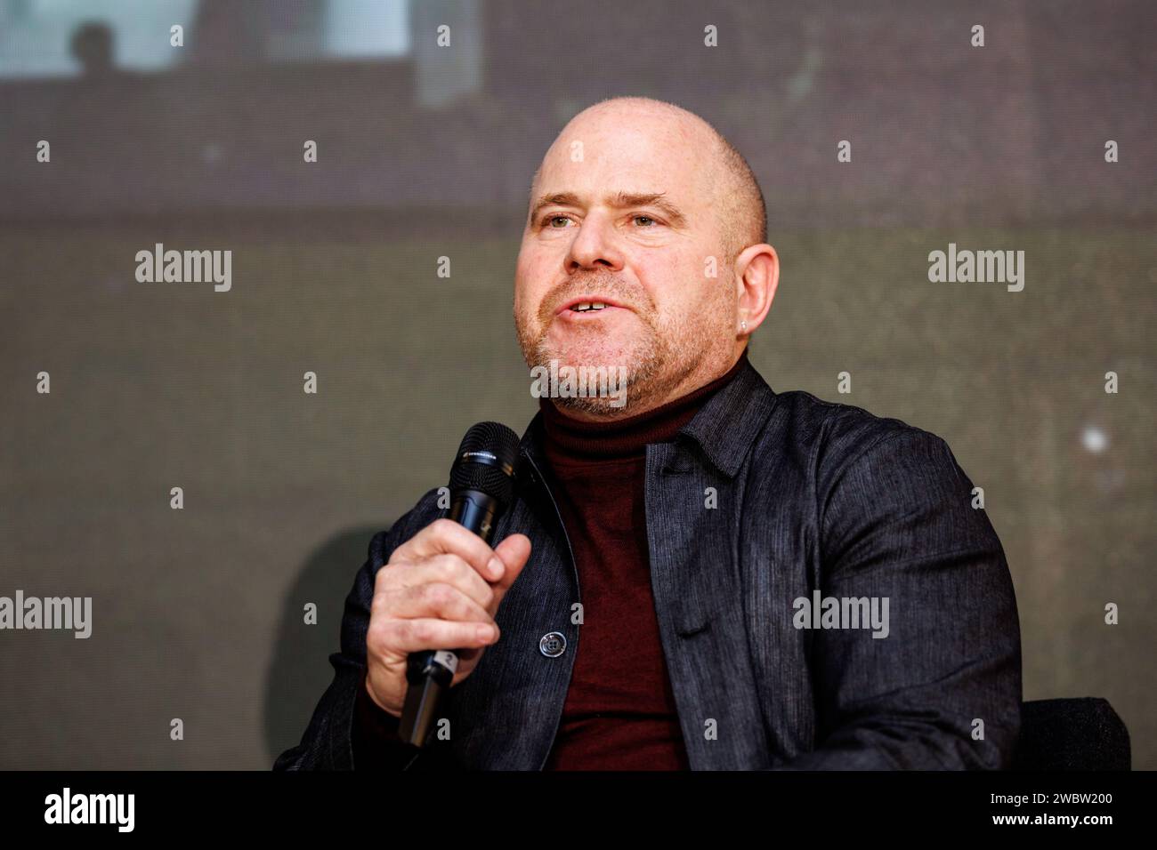 Munich, Germany. 12th Jan, 2024. Marc Spiegler, journalist, speaks at ...