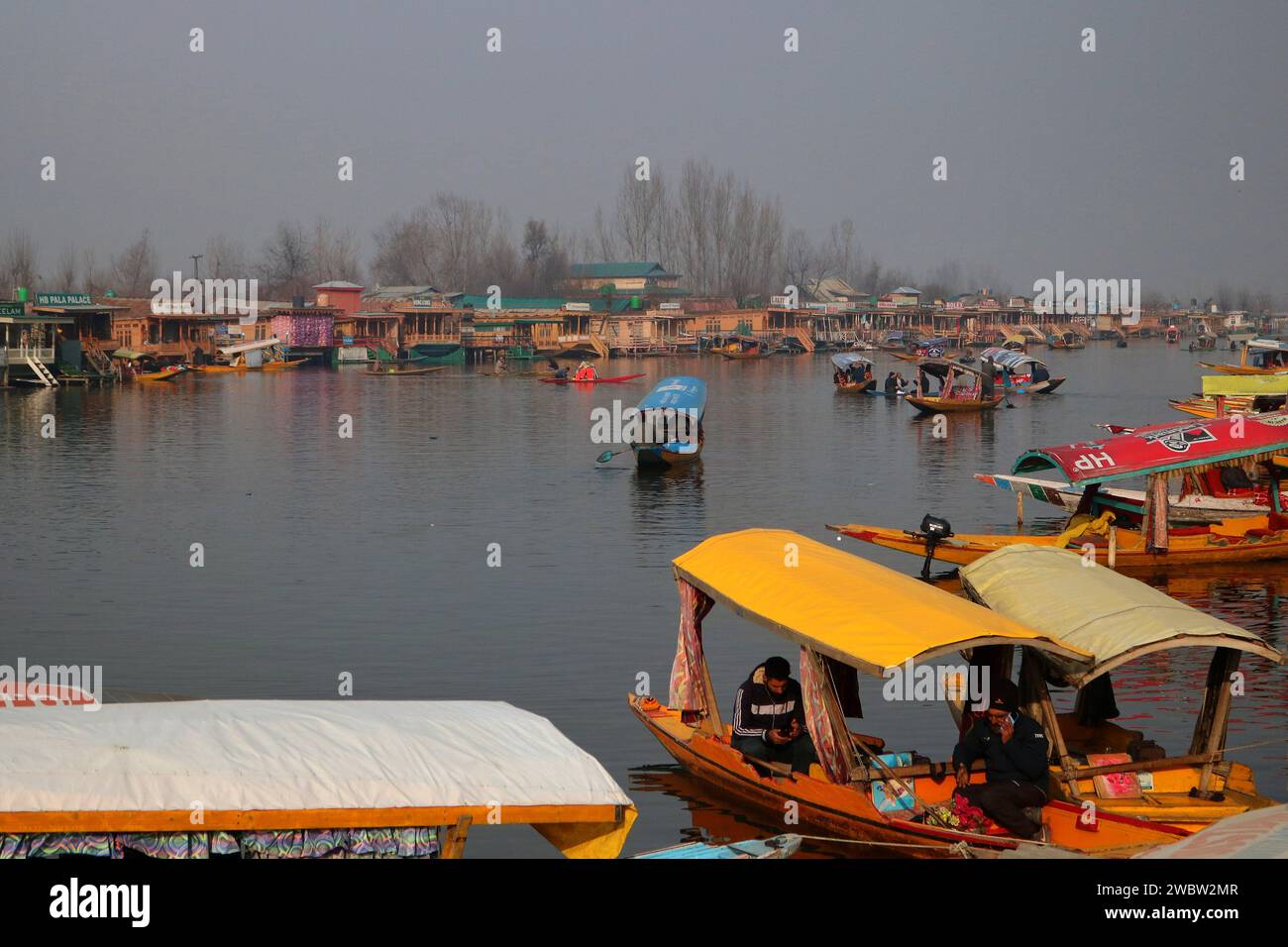 Srinagar Kashmir, India. 12th Jan, 2024. Tourists enjoy boat rides at ...