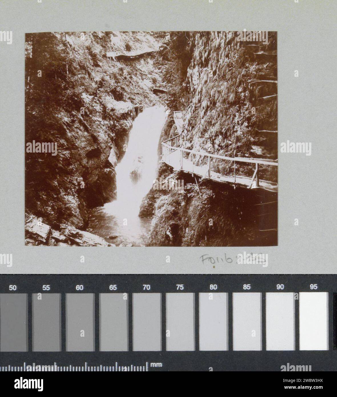 Waterfall in the Alps with mountain path next to it, c. 1905 - c. 1910 ...