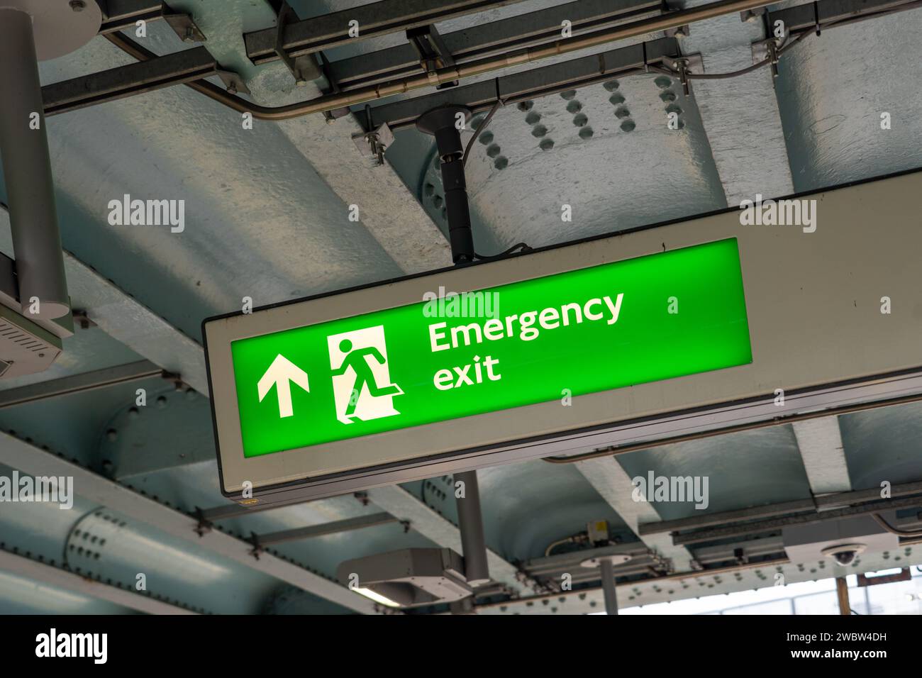 Emergency Exit sign ceiling hanging Stock Photo - Alamy