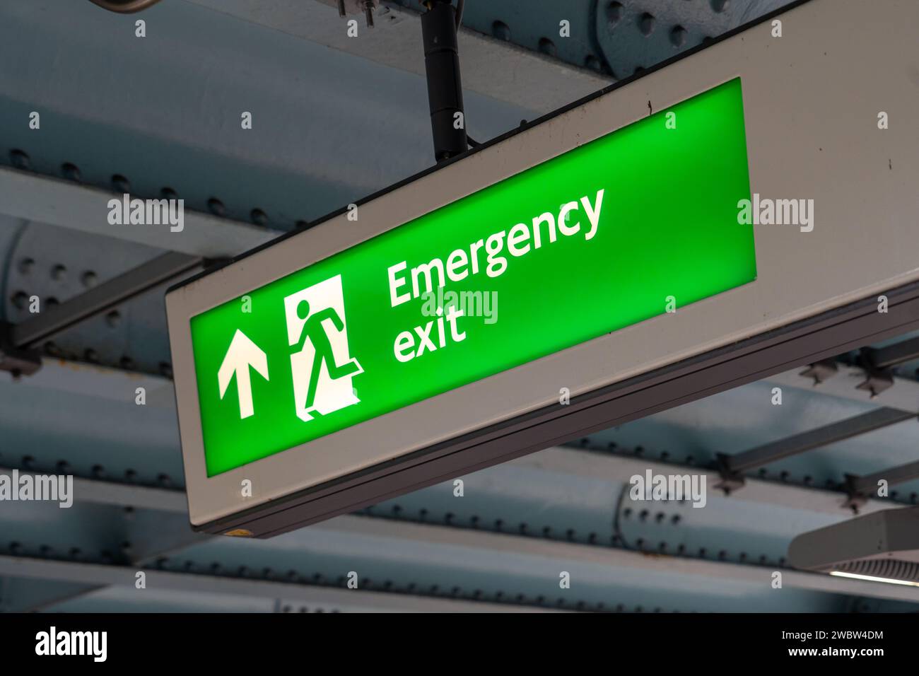 Emergency Exit sign ceiling hanging Stock Photo - Alamy