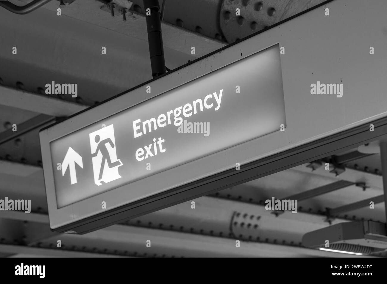 Emergency Exit sign ceiling hanging Stock Photo - Alamy