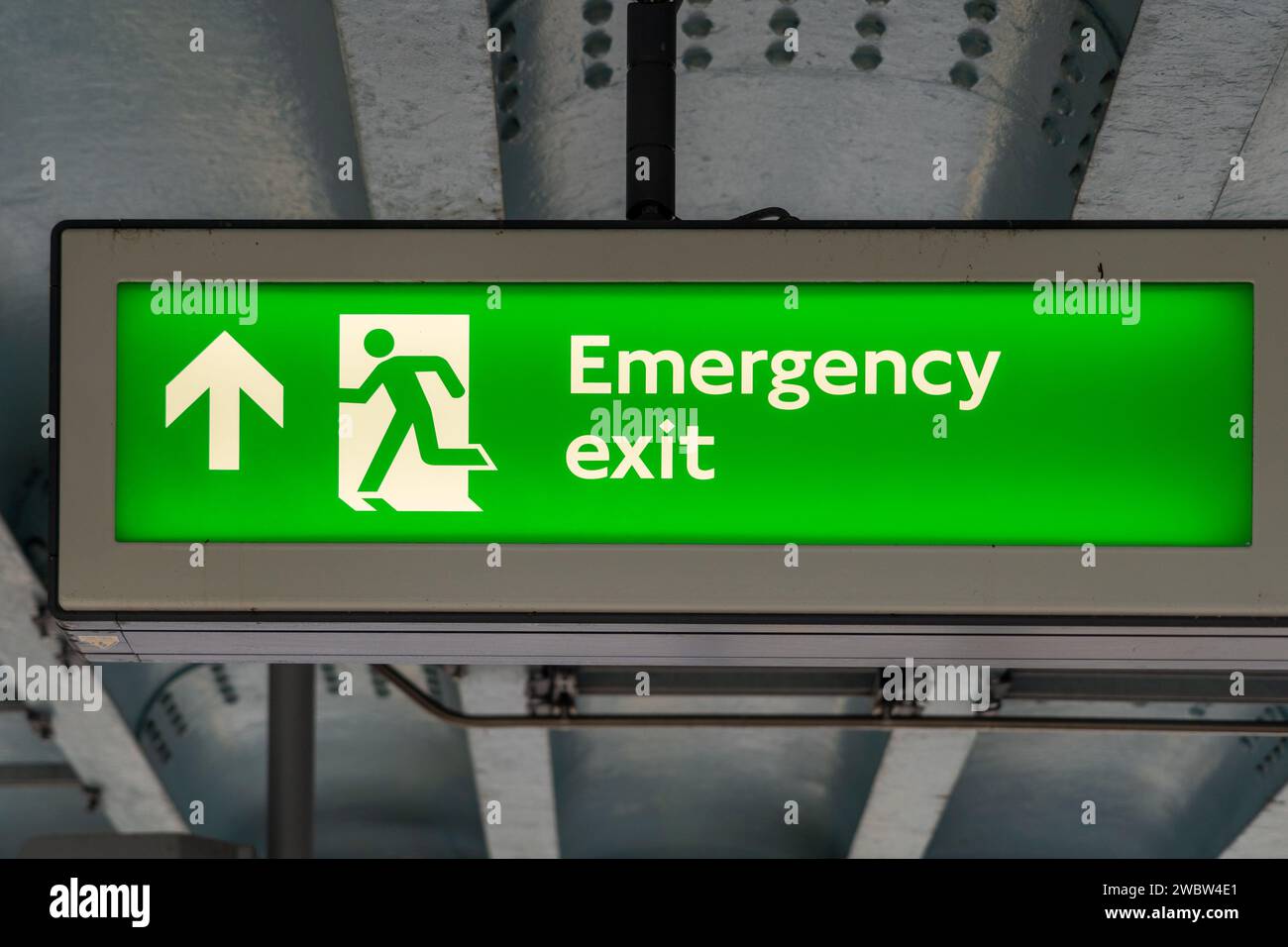 Emergency Exit sign ceiling hanging Stock Photo - Alamy