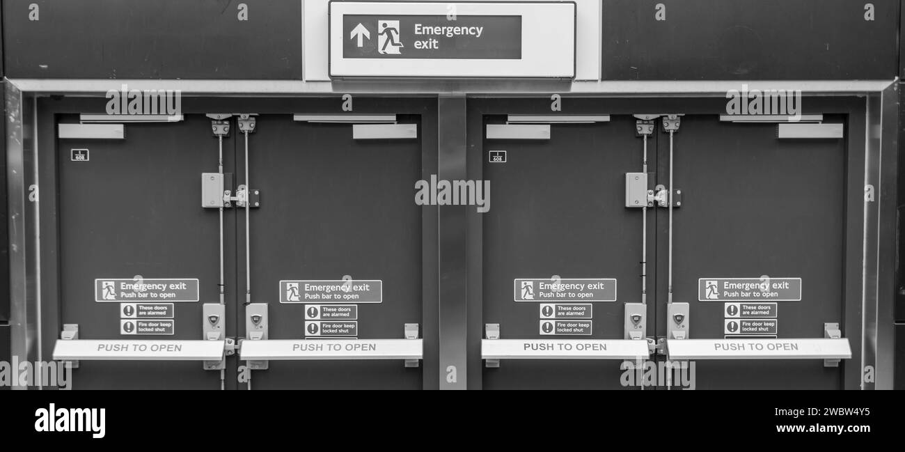 Emergency Exit sign ceiling hanging Stock Photo - Alamy
